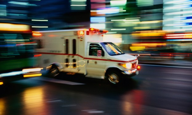 Ambulance rushing through streets at night | 6-12